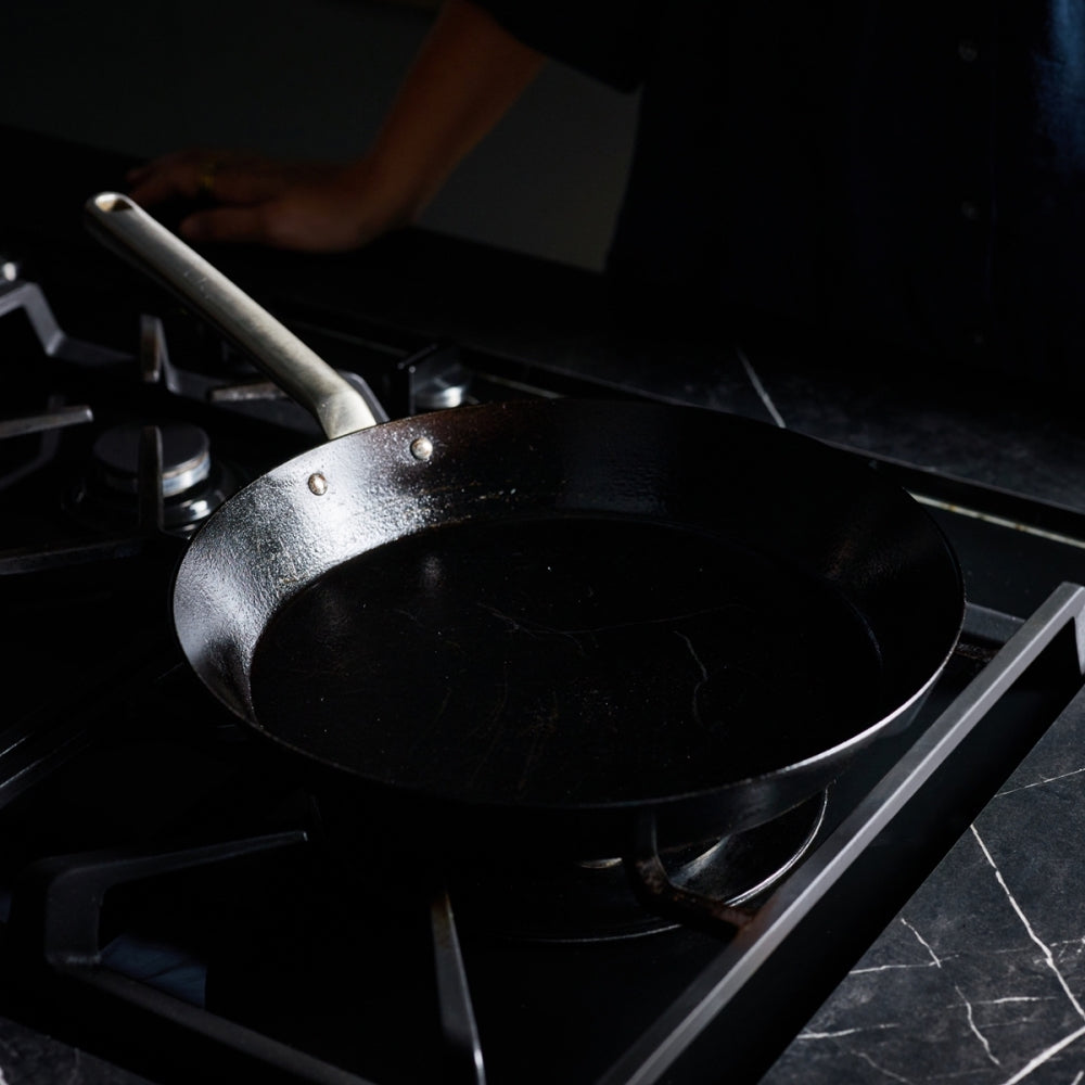 How to season black carbon steel | CookDineHost